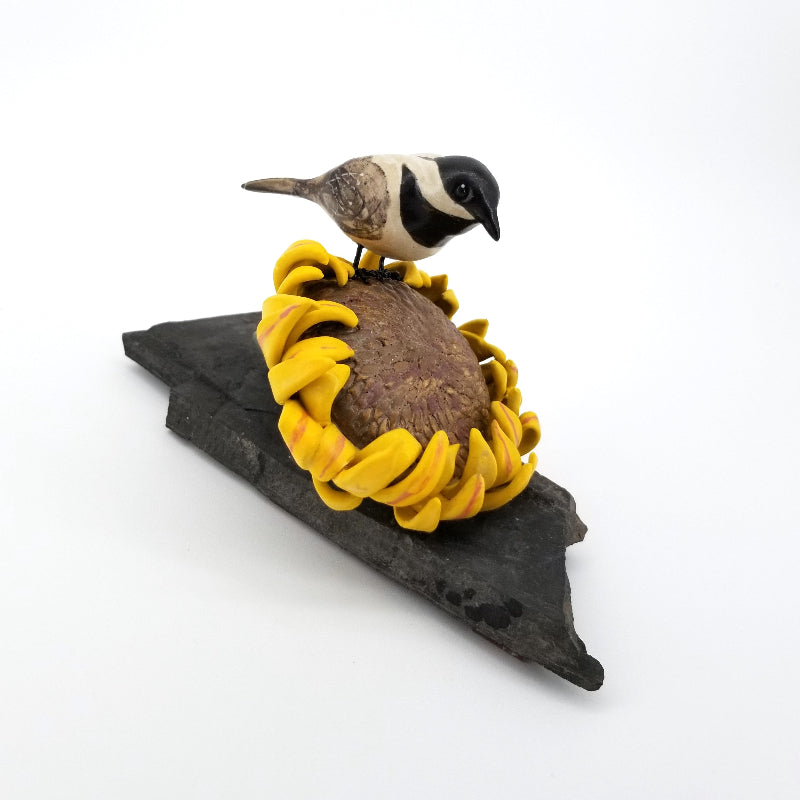 Chickadee on Sunflower Sculpture | Arts and Heritage Foundation St. Albert