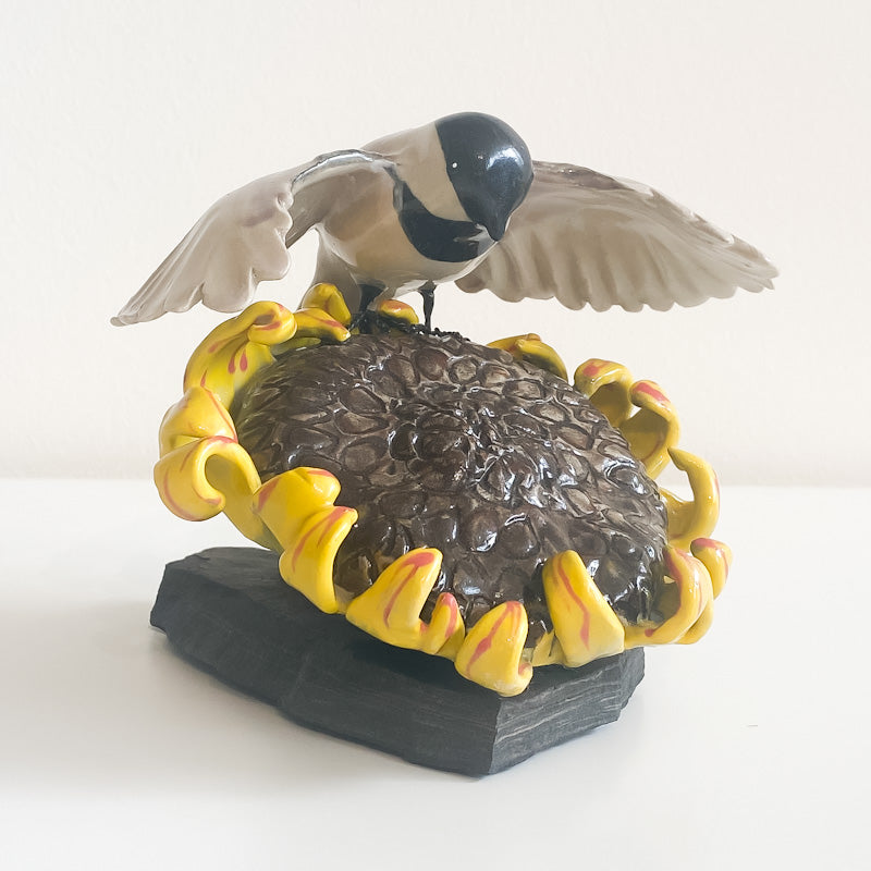 Chickadee on Sunflower Sculpture | Arts and Heritage Foundation St. Albert